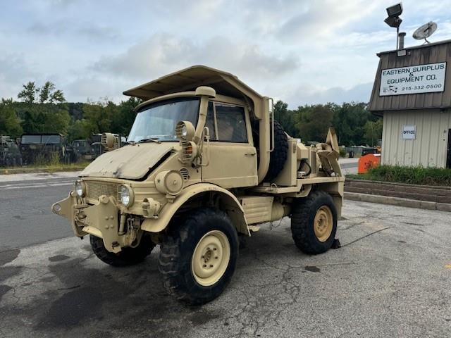 Freightiner Unimog FLU419 with Front End Loader and Rear Case Backhoe ...