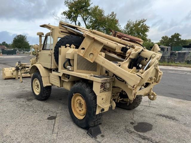 Freightiner Unimog FLU419 with Front End Loader and Rear Case Backhoe ...