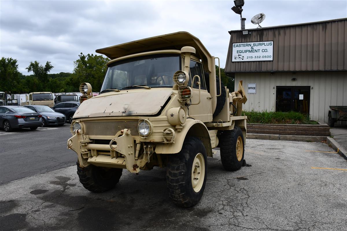 Freightiner Unimog FLU419 with Front End Loader and Rear Case Backhoe ...