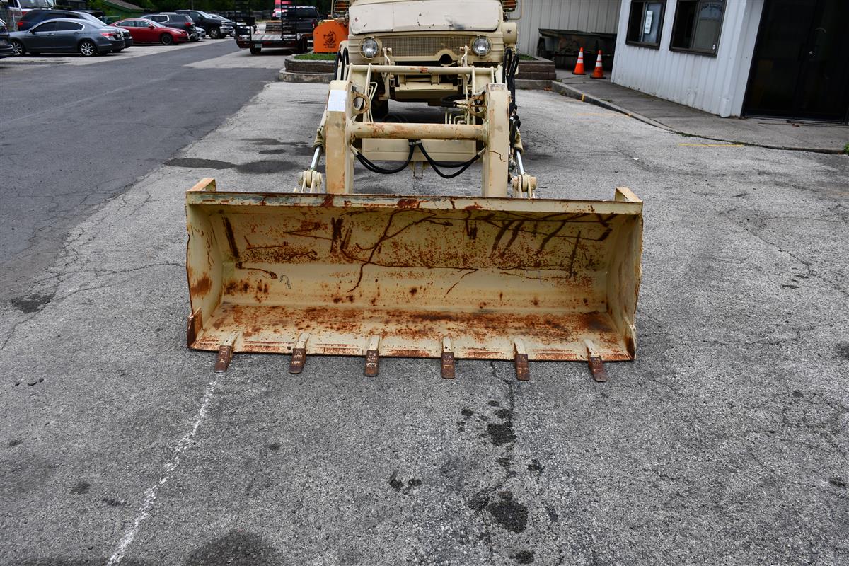 Freightiner Unimog FLU419 with Front End Loader and Rear Case Backhoe ...