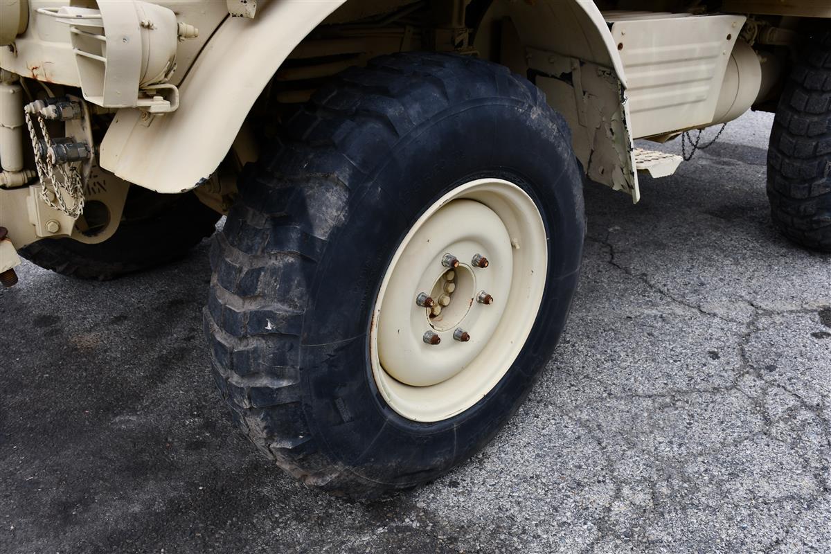 Freightiner Unimog FLU419 with Front End Loader and Rear Case Backhoe ...