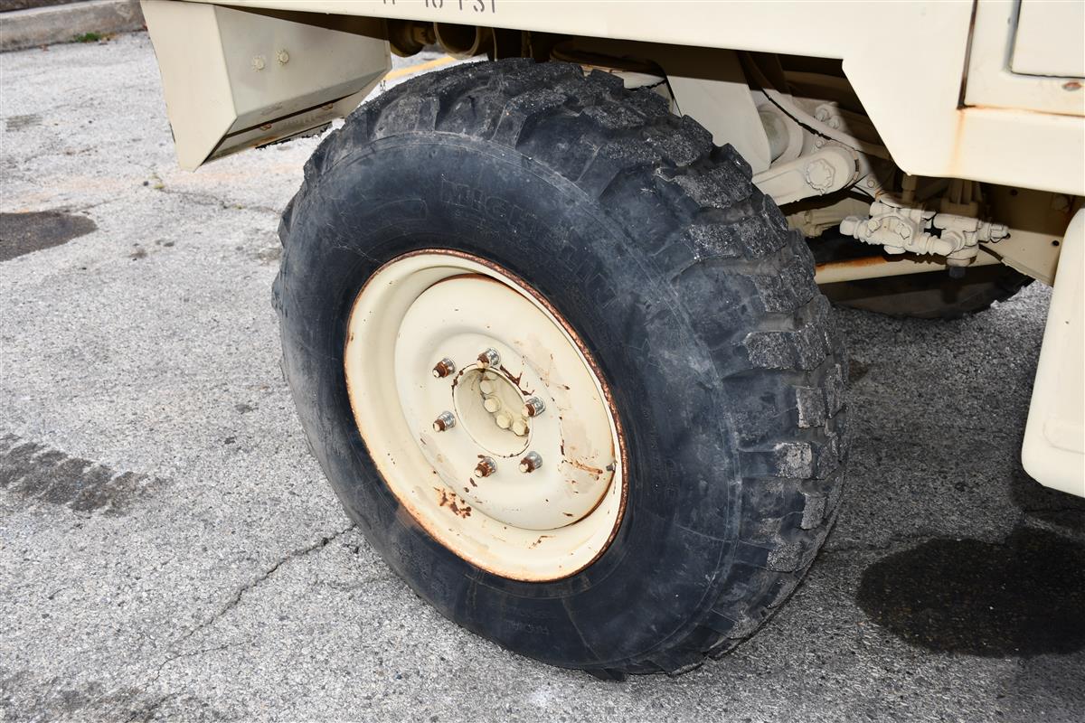 Freightiner Unimog FLU419 with Front End Loader and Rear Case Backhoe ...