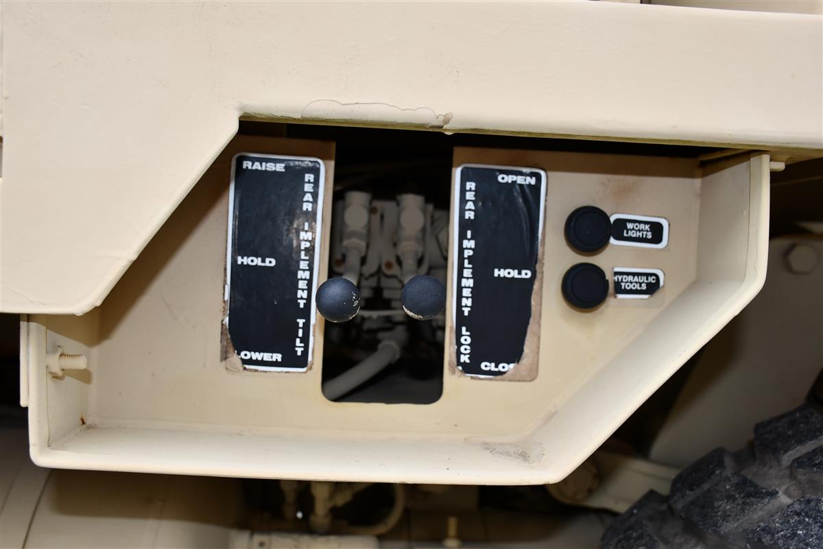 Freightiner Unimog FLU419 with Front End Loader and Rear Case Backhoe ...