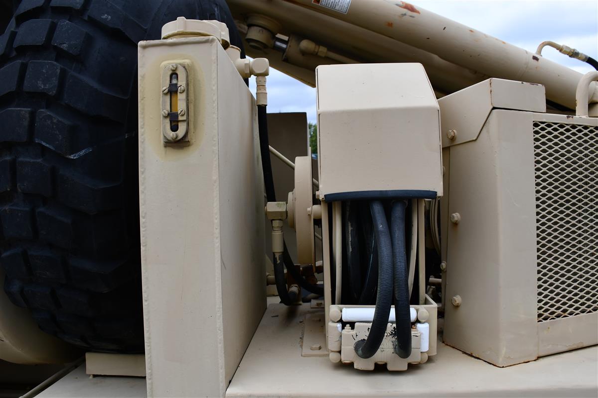 Freightiner Unimog FLU419 with Front End Loader and Rear Case Backhoe ...