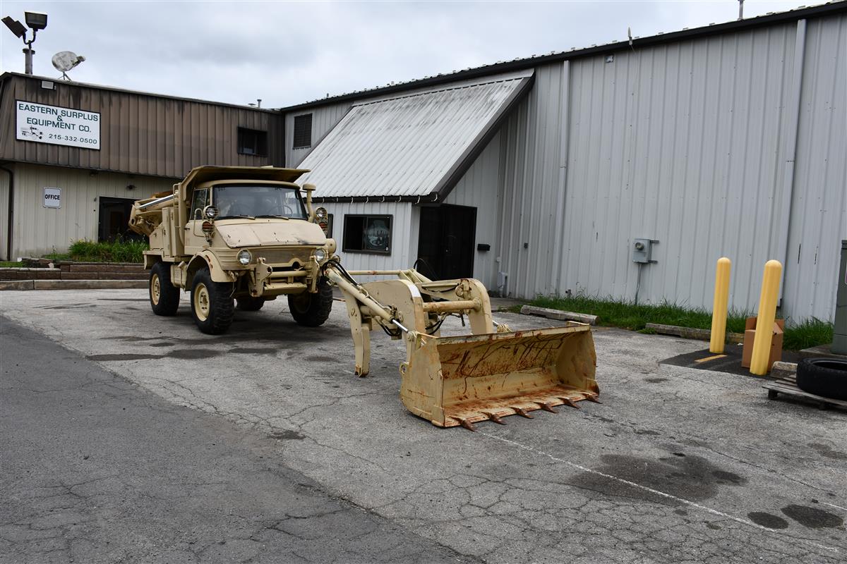 Freightiner Unimog FLU419 with Front End Loader and Rear Case Backhoe ...