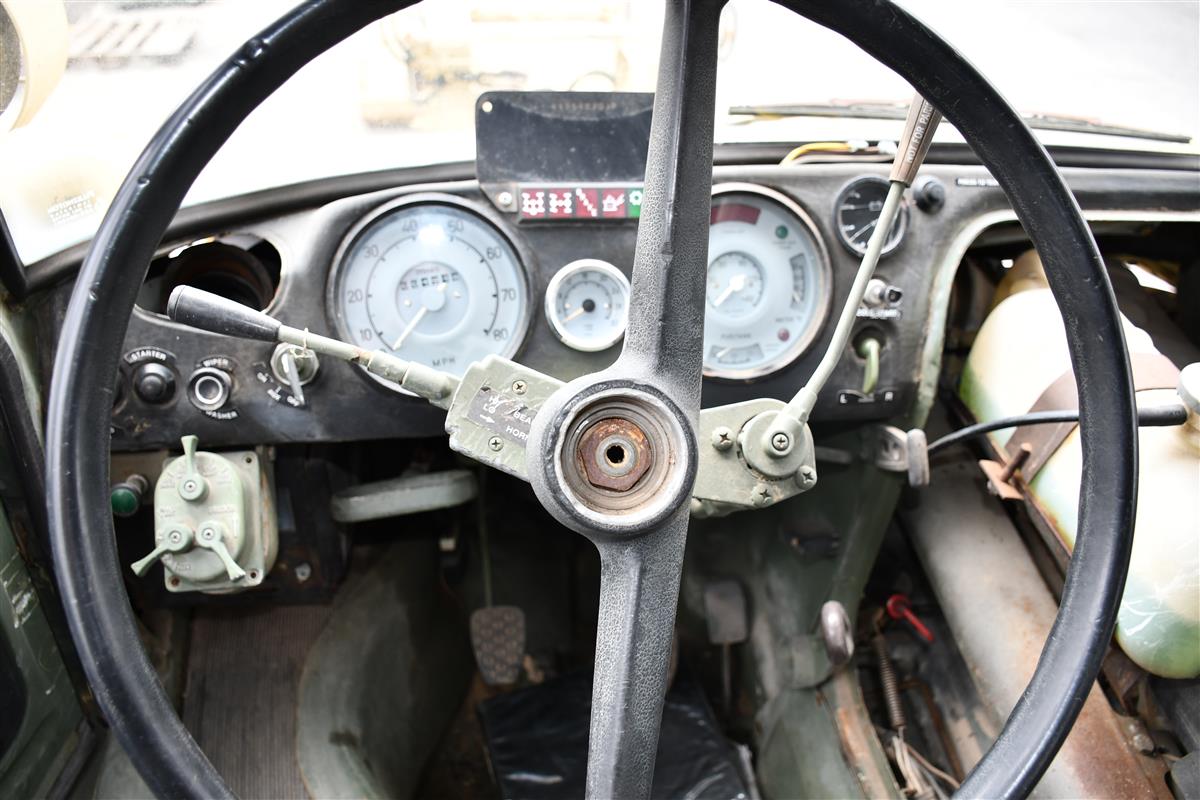 Freightiner Unimog FLU419 with Front End Loader and Rear Case Backhoe ...