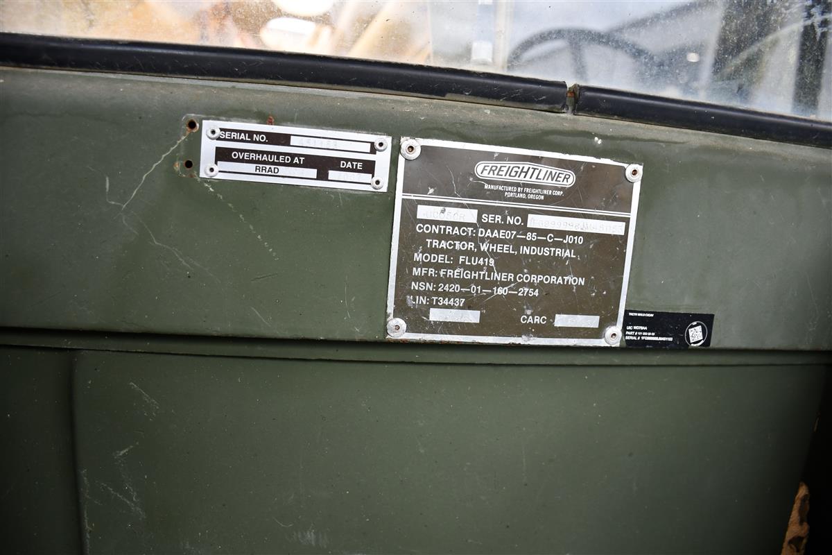 Freightiner Unimog FLU419 with Front End Loader and Rear Case Backhoe ...