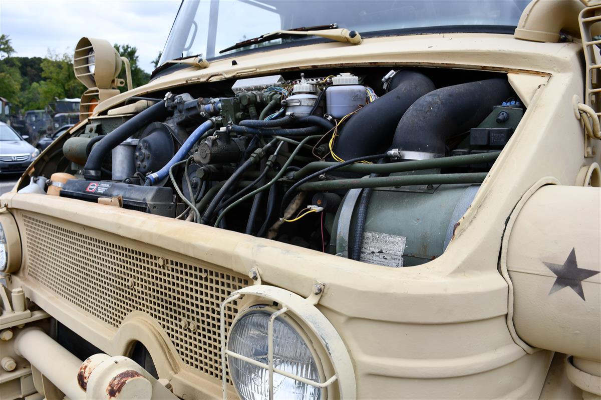 Freightiner Unimog FLU419 with Front End Loader and Rear Case Backhoe ...